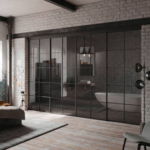 Fixed partition - GRUPO STYLO INTERIORISMO SL - sliding / metal / glass