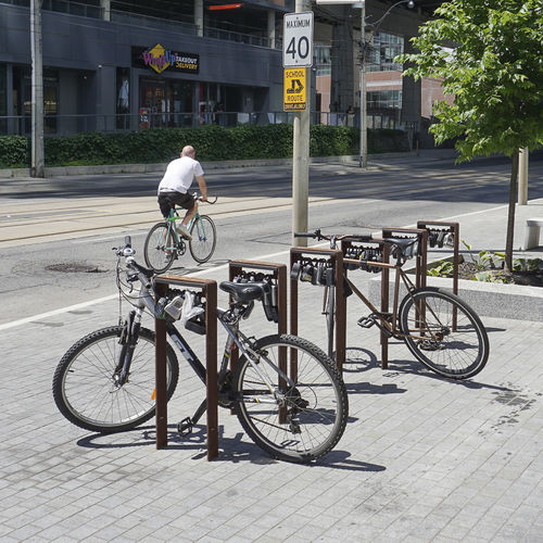 Floor-mounted bike rack - STRIP - Streetlife - for public space / COR-TEN® steel / plastic