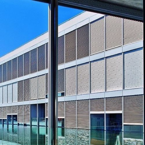 Metal solar shading - METALUNIC - GRIESSER - for facade / window / vertical