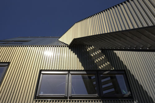 Ribbed metal sheet - EURAMAX COATED PRODUCTS - steel / for facade cladding
