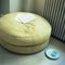 Contemporary ottoman - DREAM BOAT - OCHRE - fabric / leather / round