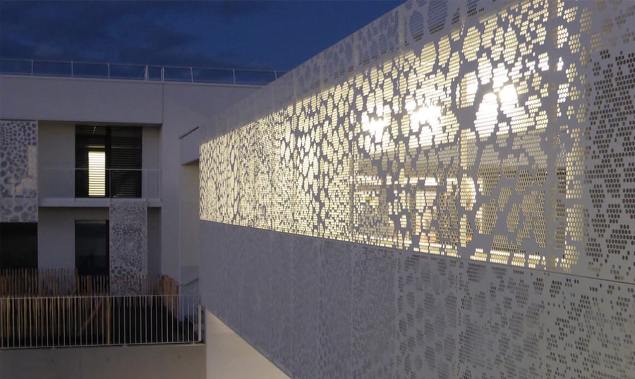 Architectural facade, sun visor and privacy screen made of perforated ...