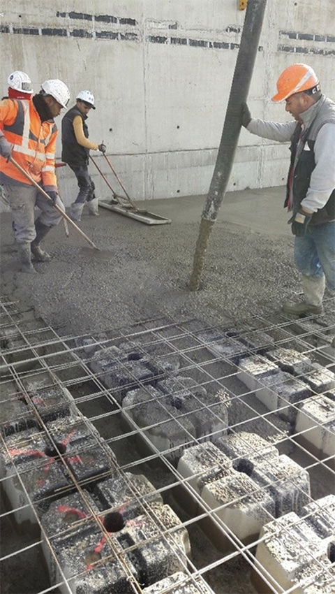 Post-tensioned and lightened slabs with U-Boot® Beton for the multi ...