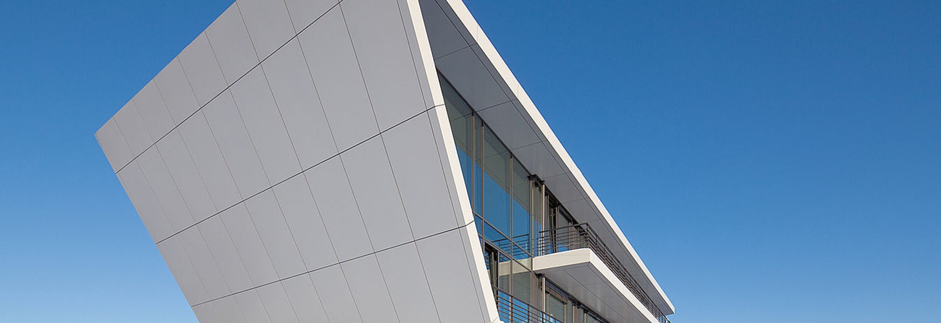 Denker & Wulf - Angled architecture with homogenous facade cladded with ...